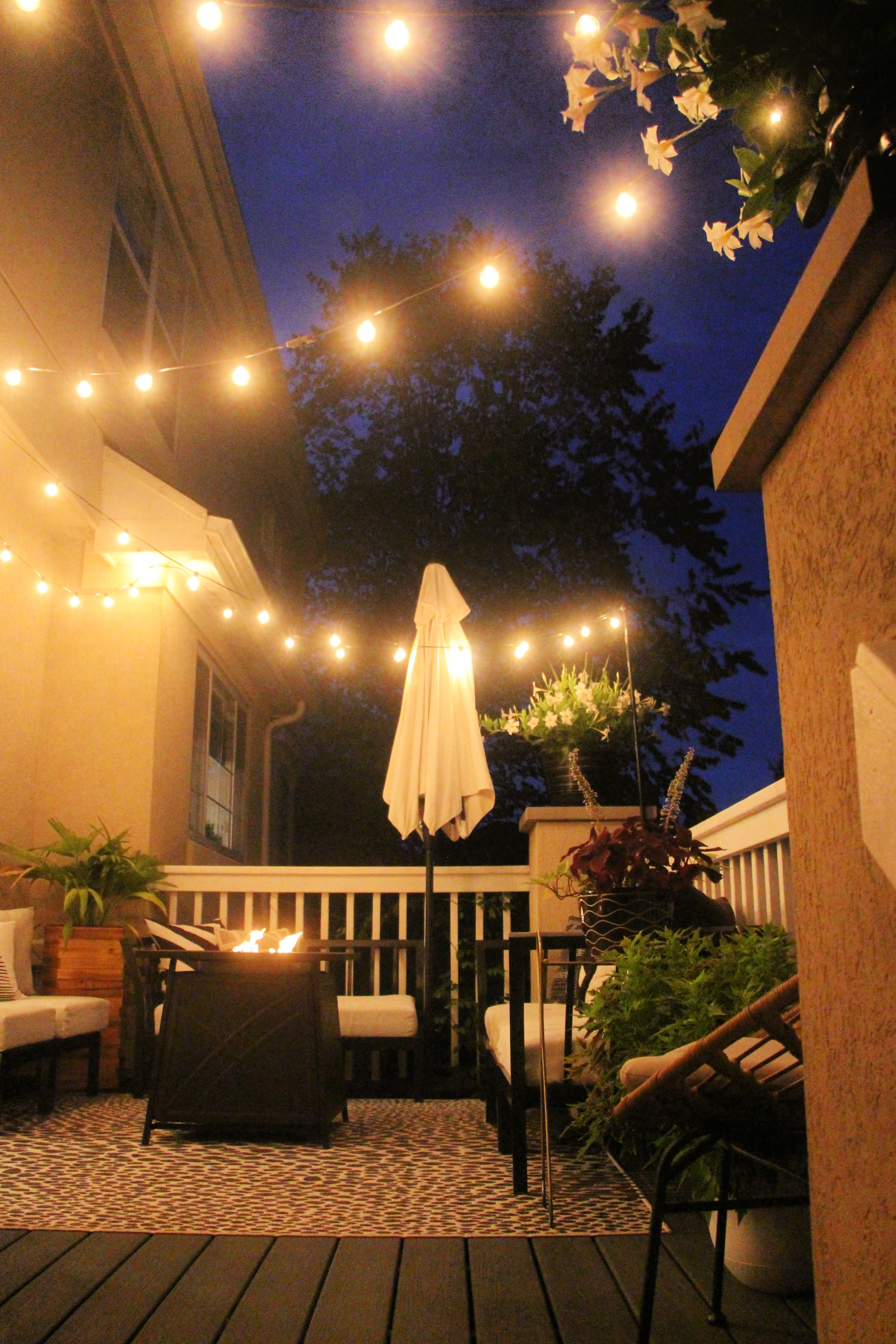 small back deck reveal at night - This is our Bliss - This is our Bliss