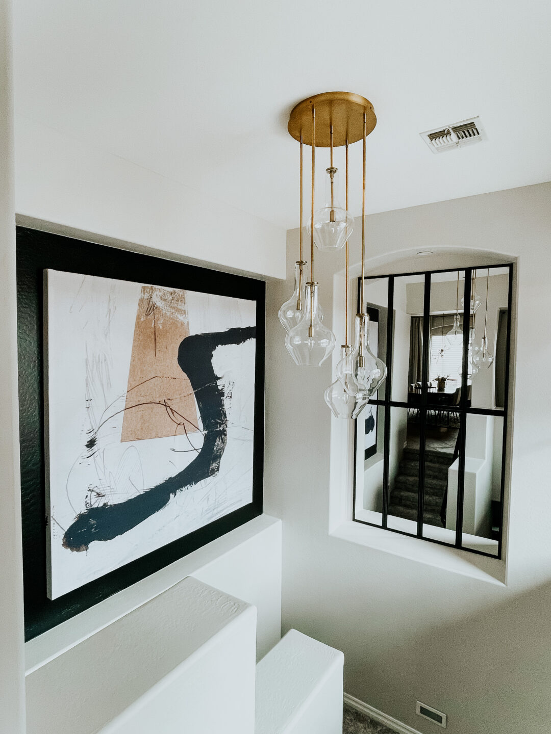 HOW TO FILL A STAIRWELL NICHE WITH FULL-LENGTH MIRRORS