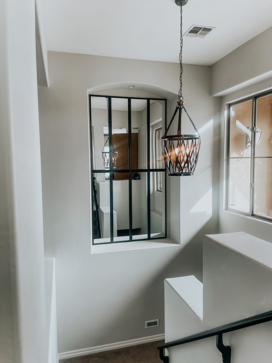 HOW TO FILL A STAIRWELL NICHE WITH FULL-LENGTH MIRRORS